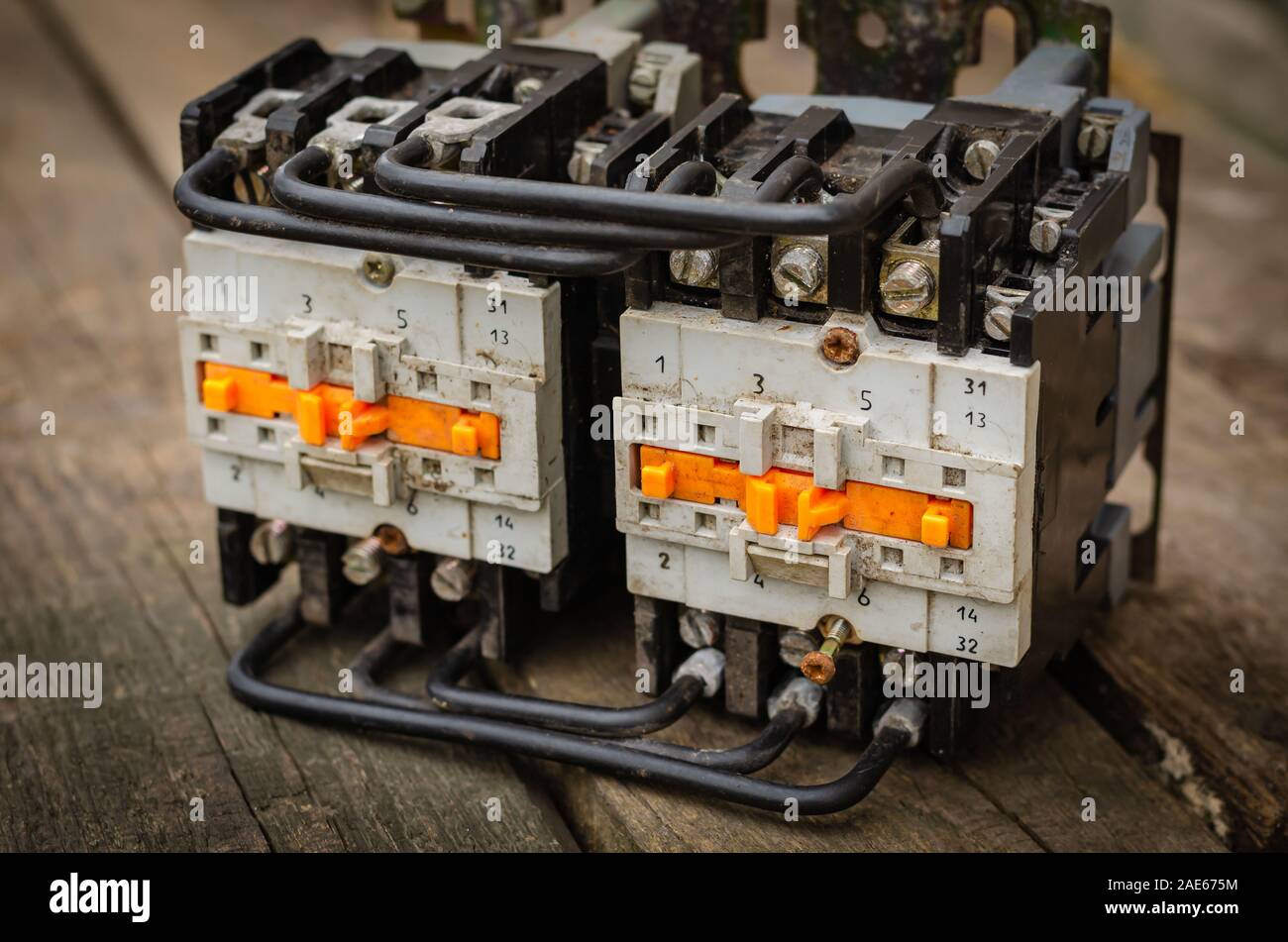 Close-up of a used electric starter (magnetic starter). An ...