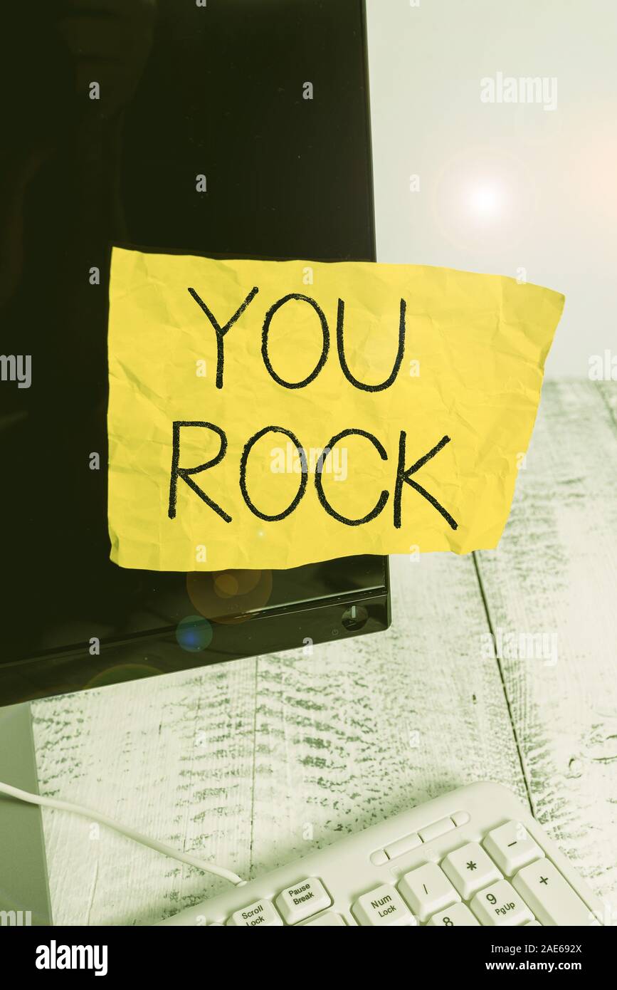Writing note showing You Rock. Business concept for slang phrase of ...