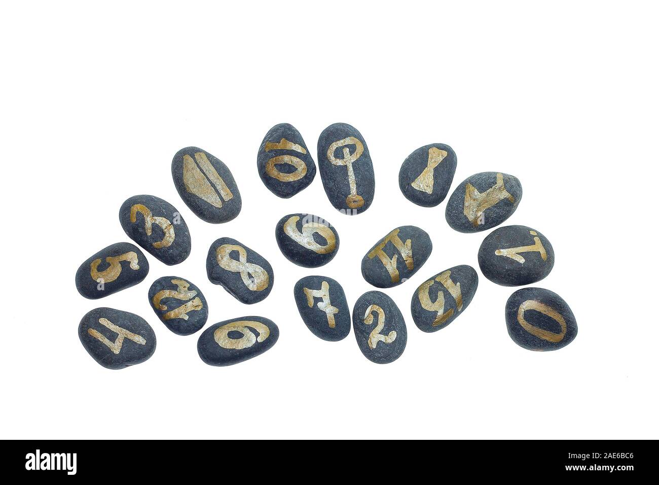 Group of stone runes isolated on a white background Stock Photo - Alamy