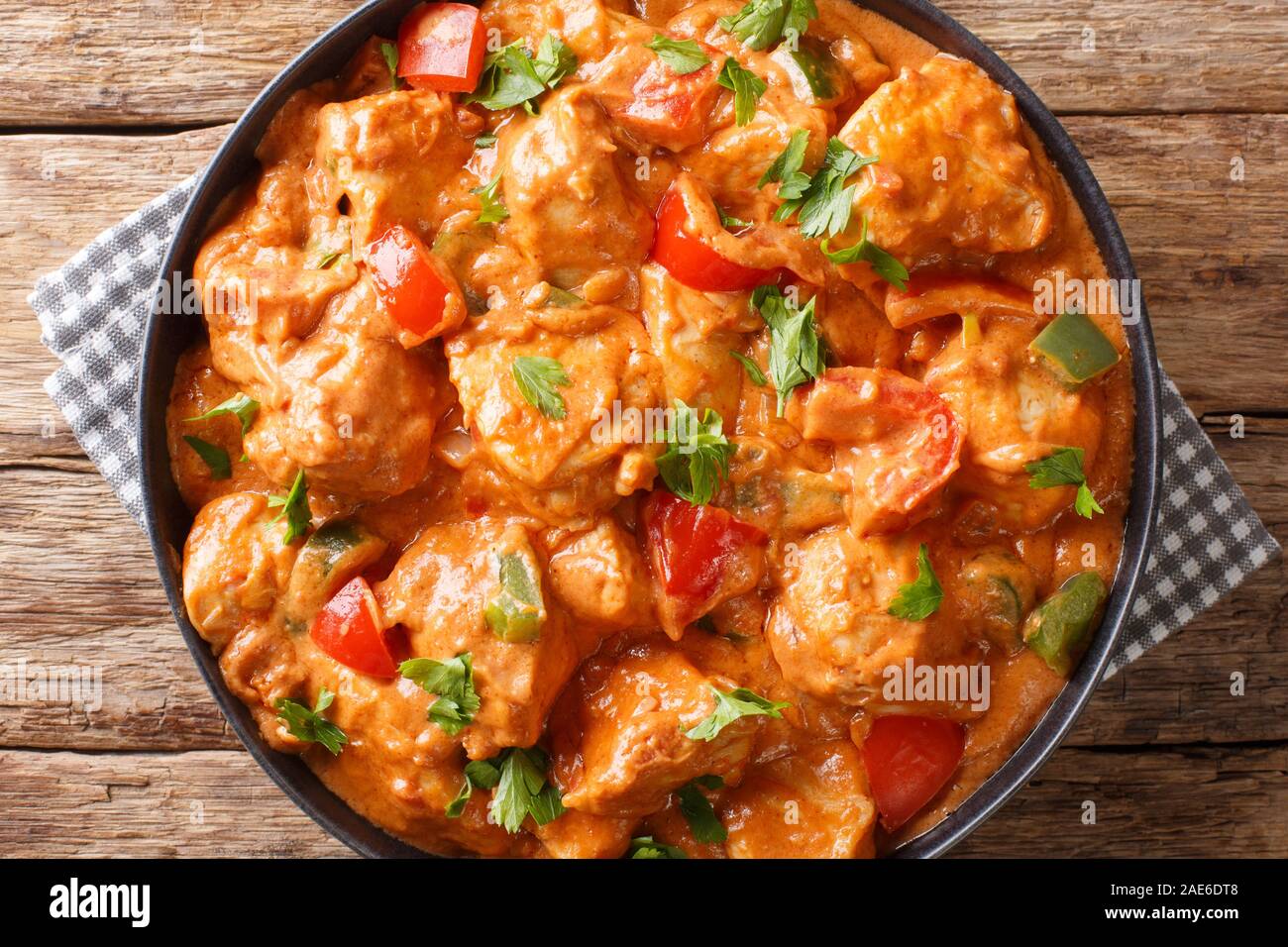 Authentic african chicken mafe in peanut sauce, with tomatoes, peppers ...