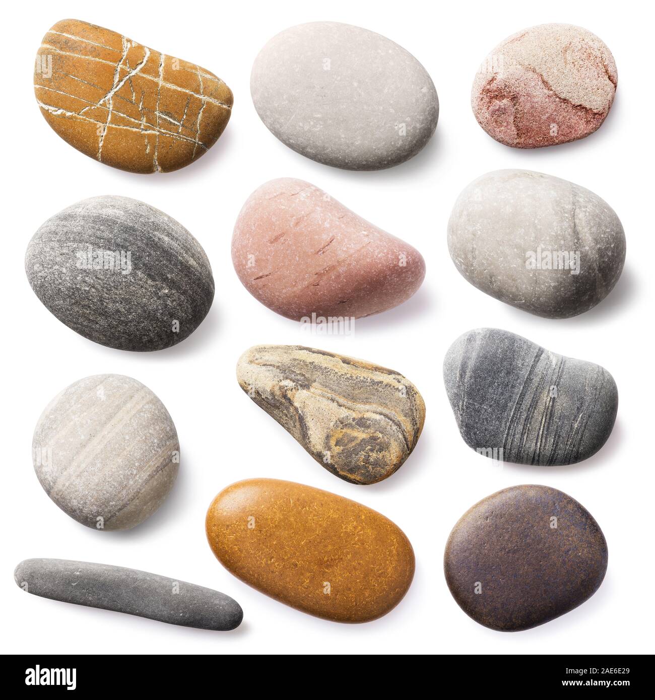 Large set of sea stones isolated on a white background. Top view of a ...