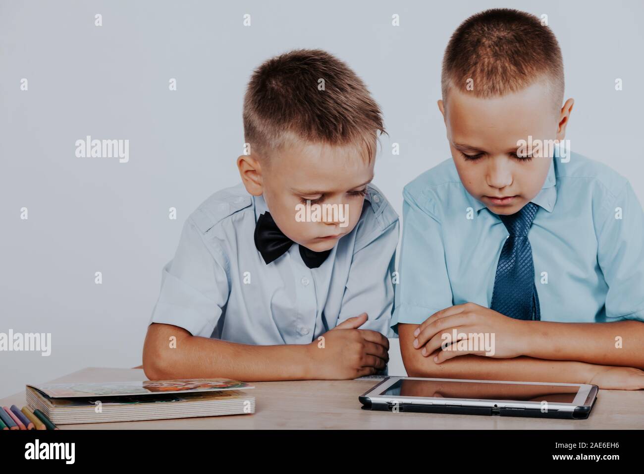 boys learn lessons Internet Tablet school lesson Stock Photo - Alamy