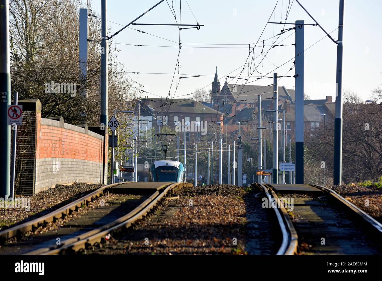A Nottingham Tram on the tracks at the bottom of a steep gradient ...