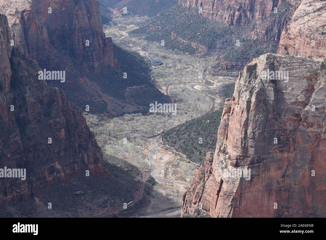 The Virgin River winds its way through Zion Canyon, with towering ...