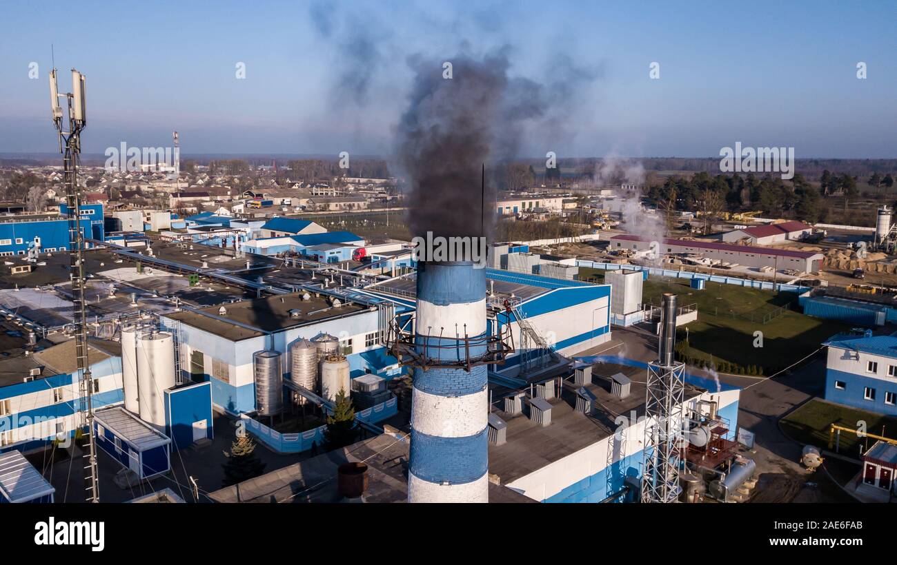 black smoke from the factory chimney top view Stock Photo - Alamy