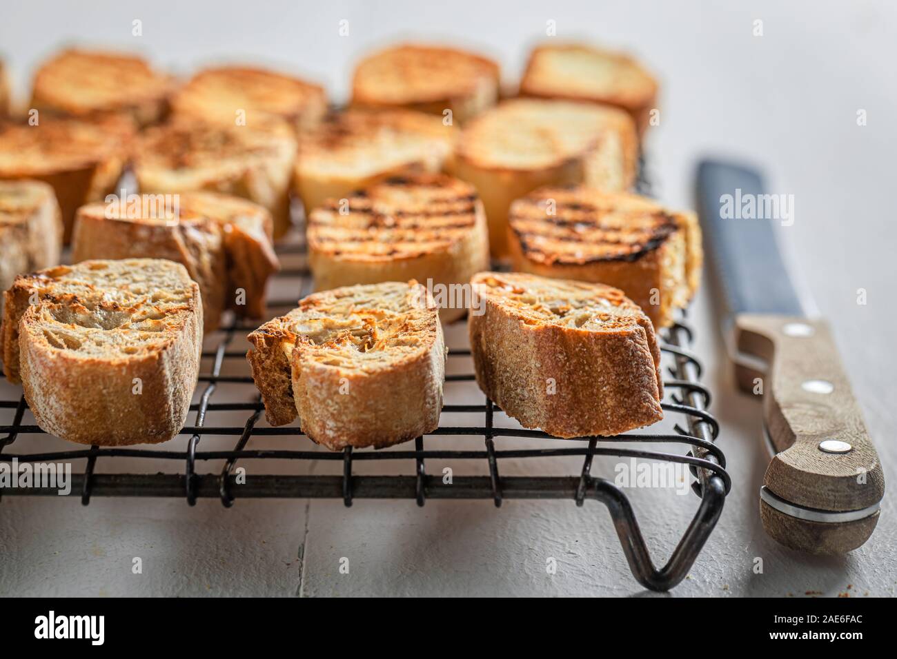 Homemade toasted wholegrain bread on a cooling sheet Stock Photo - Alamy