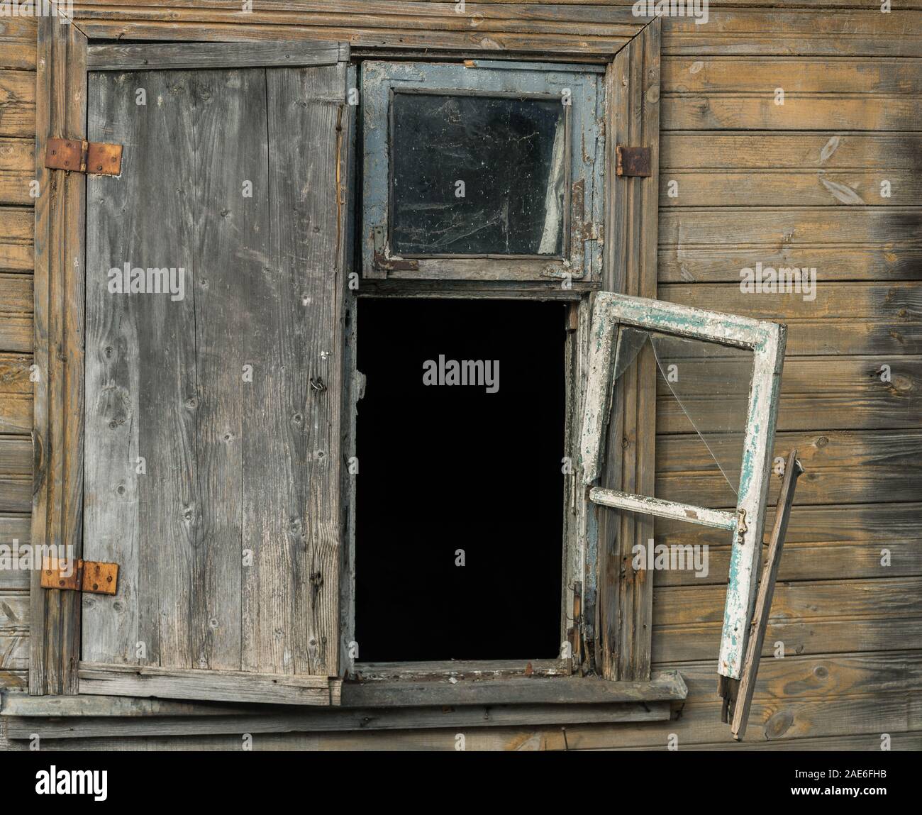 Broken window frame of old wooden house Stock Photo - Alamy