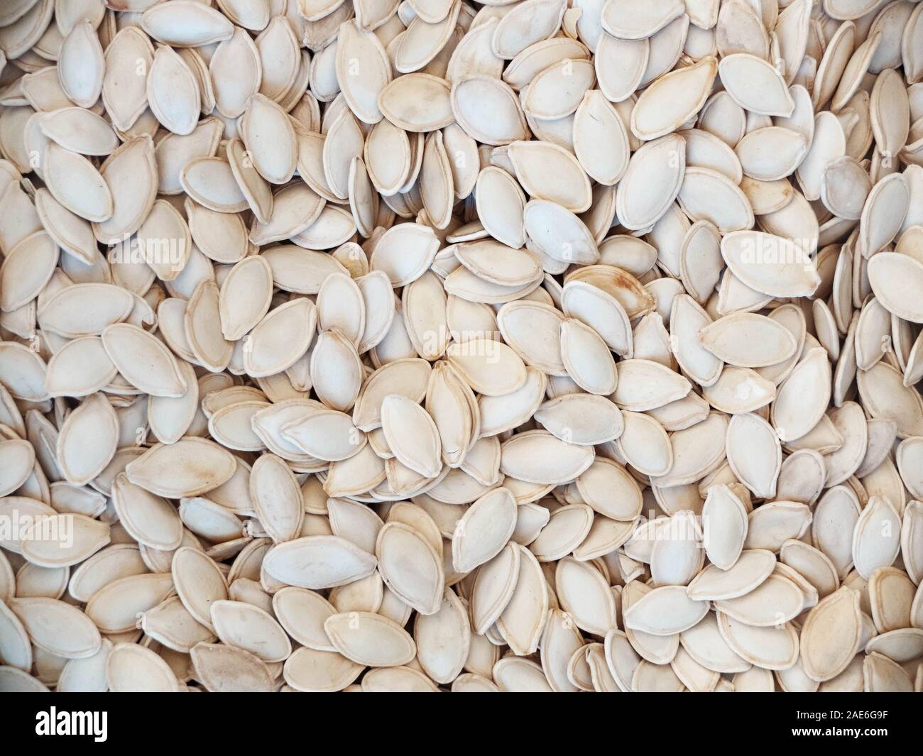Organic pumpkin seed. Texture or background concept Stock Photo - Alamy