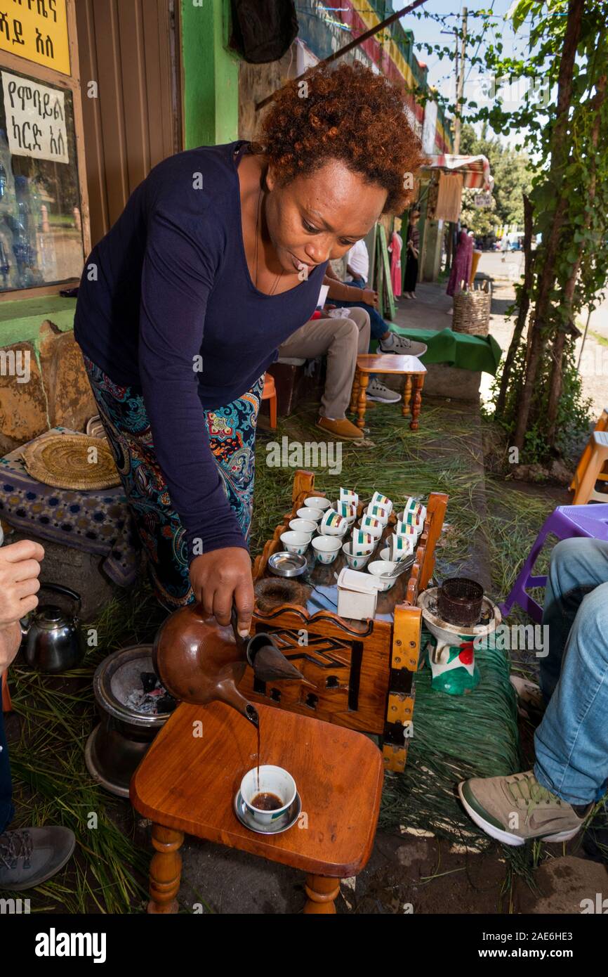 Ethiopia, Amhara Region, Gondar, town centre, woman in roadside stall ...