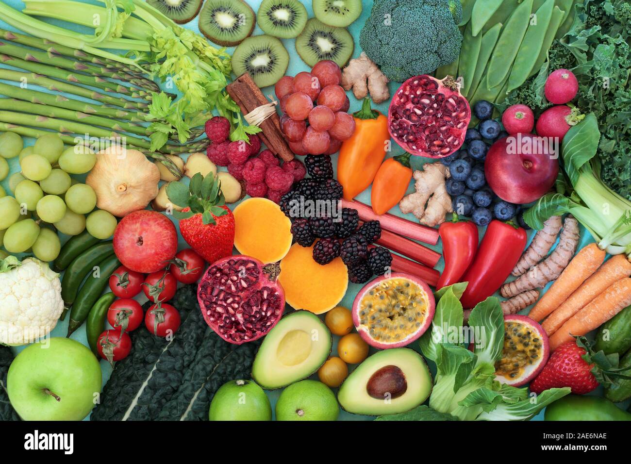 Healthy heart food concept with fruit, vegetables, herbs and spices ...