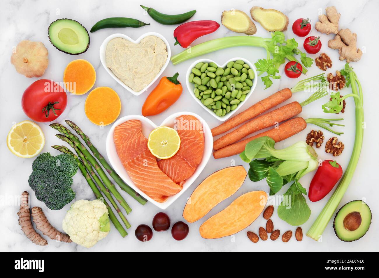 Healthy heart food with fish, fruit, vegetables, nuts, dips & spice ...