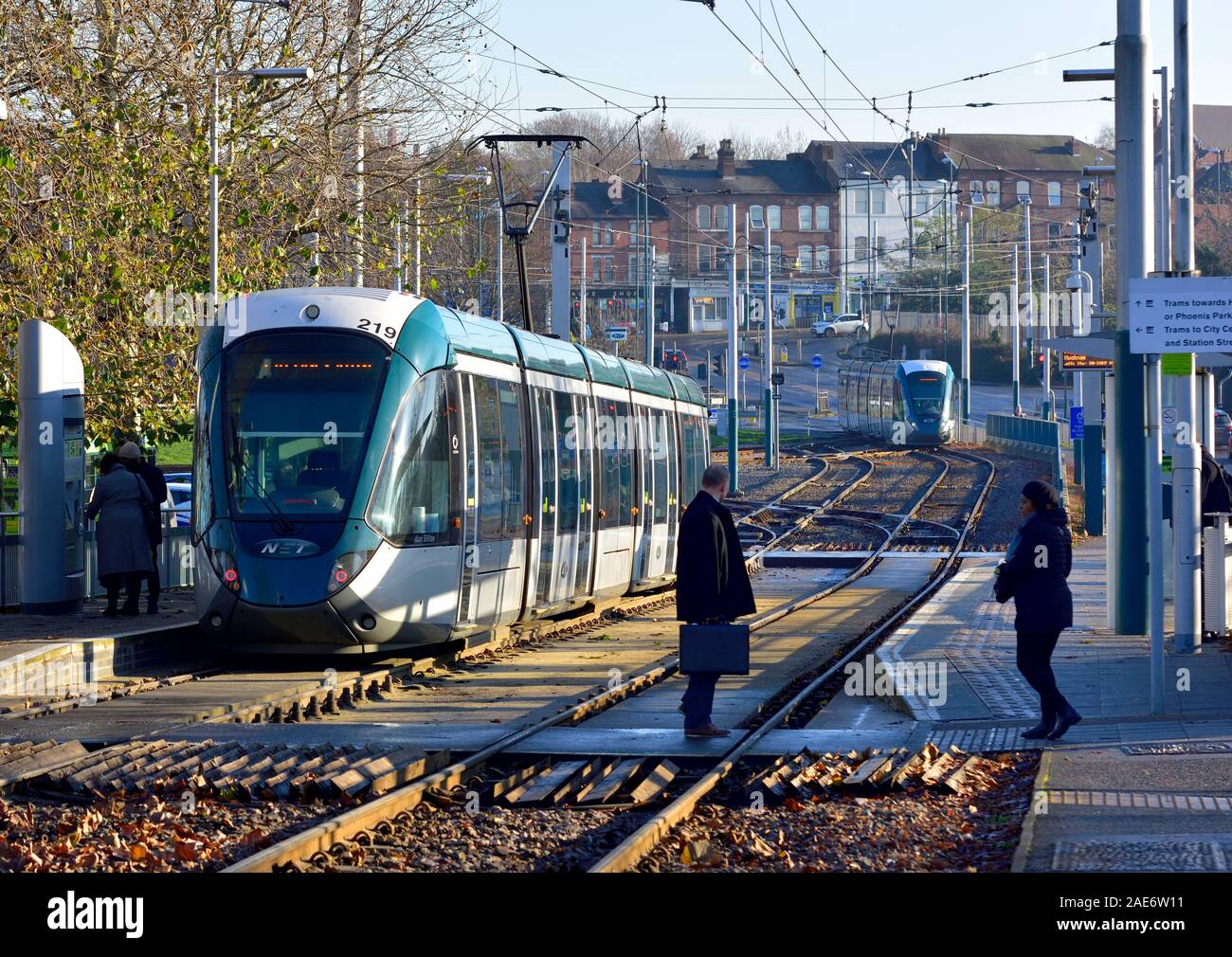 Passengers crossing the tram track hi-res stock photography and images ...