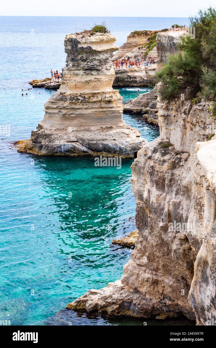 Torre Sant Andrea, Puglia, Italy - September 09, 2019: People diving ...