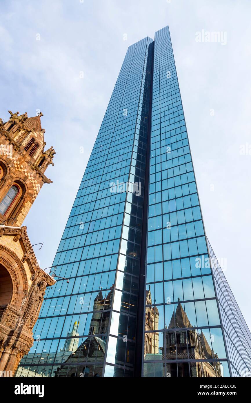 Bostonian landmarks: The John Hancock Tower reflecting Trinity Church ...
