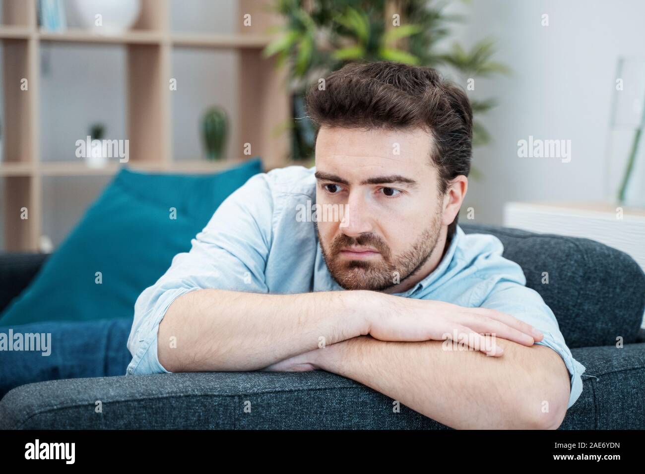 Man home depressed hi-res stock photography and images - Alamy