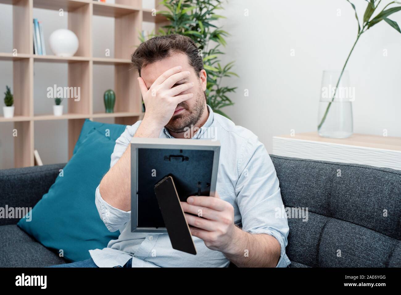 Man frame unhappy picture hi-res stock photography and images - Alamy