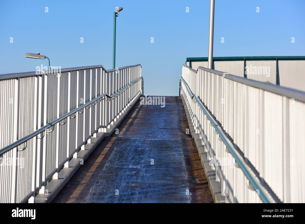 Steep pedestrian ramp with handrails,UK Stock Photo - Alamy