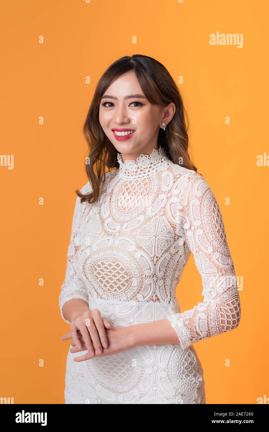 Young healthy Asian woman with smiley face Stock Photo - Alamy