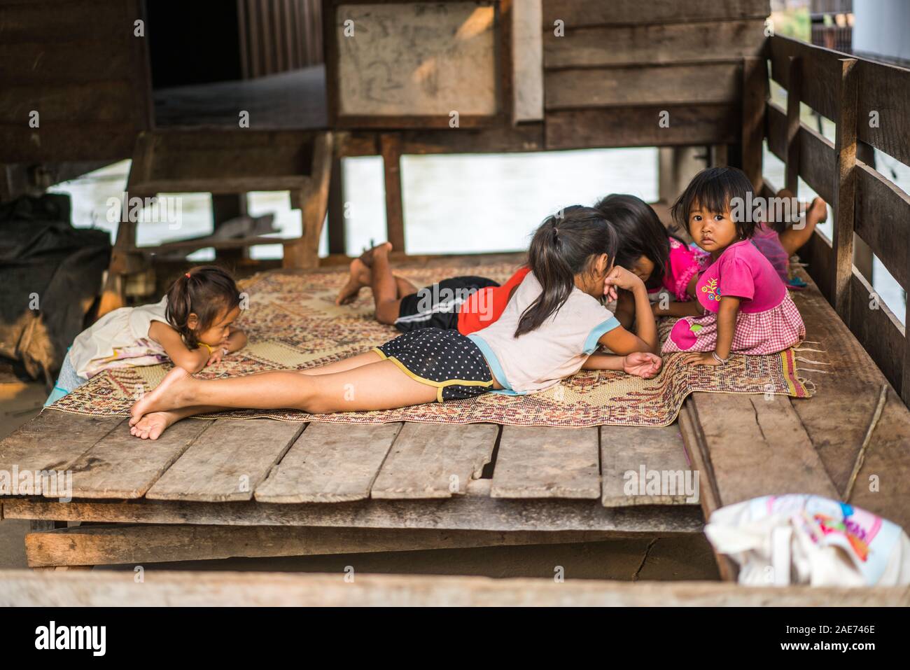 Local Children In The Street Of The Don Khon Island 4000 Islands Laos local-children-in-the-street-of-the-don-khon-island-4000-islands-laos