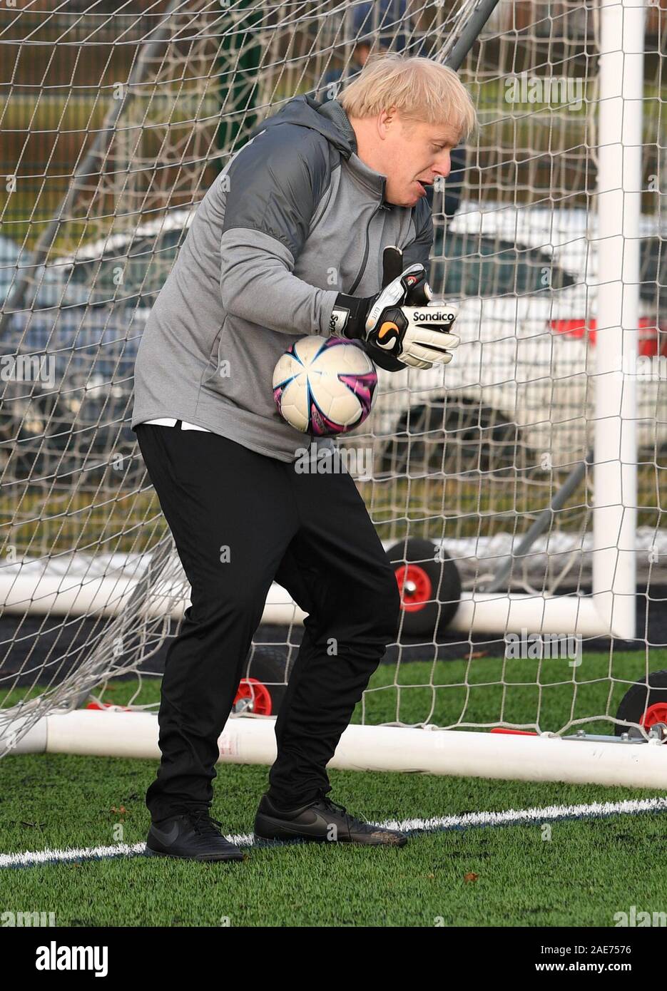Prime Minister Boris Johnson tries his hand in goal before a football ...