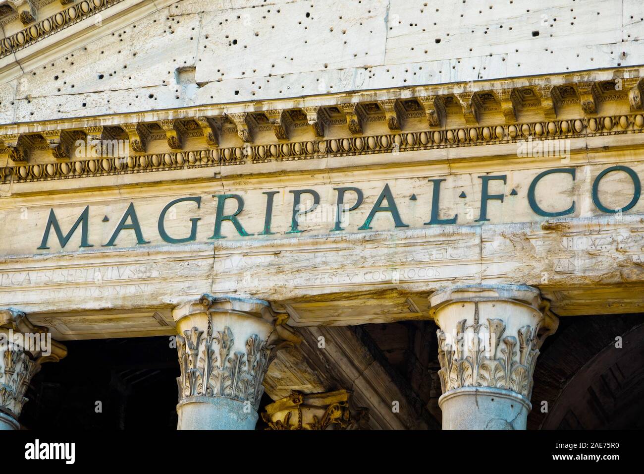 Column heads and writing detail on Pantheon in Rome, Italy Stock Photo ...