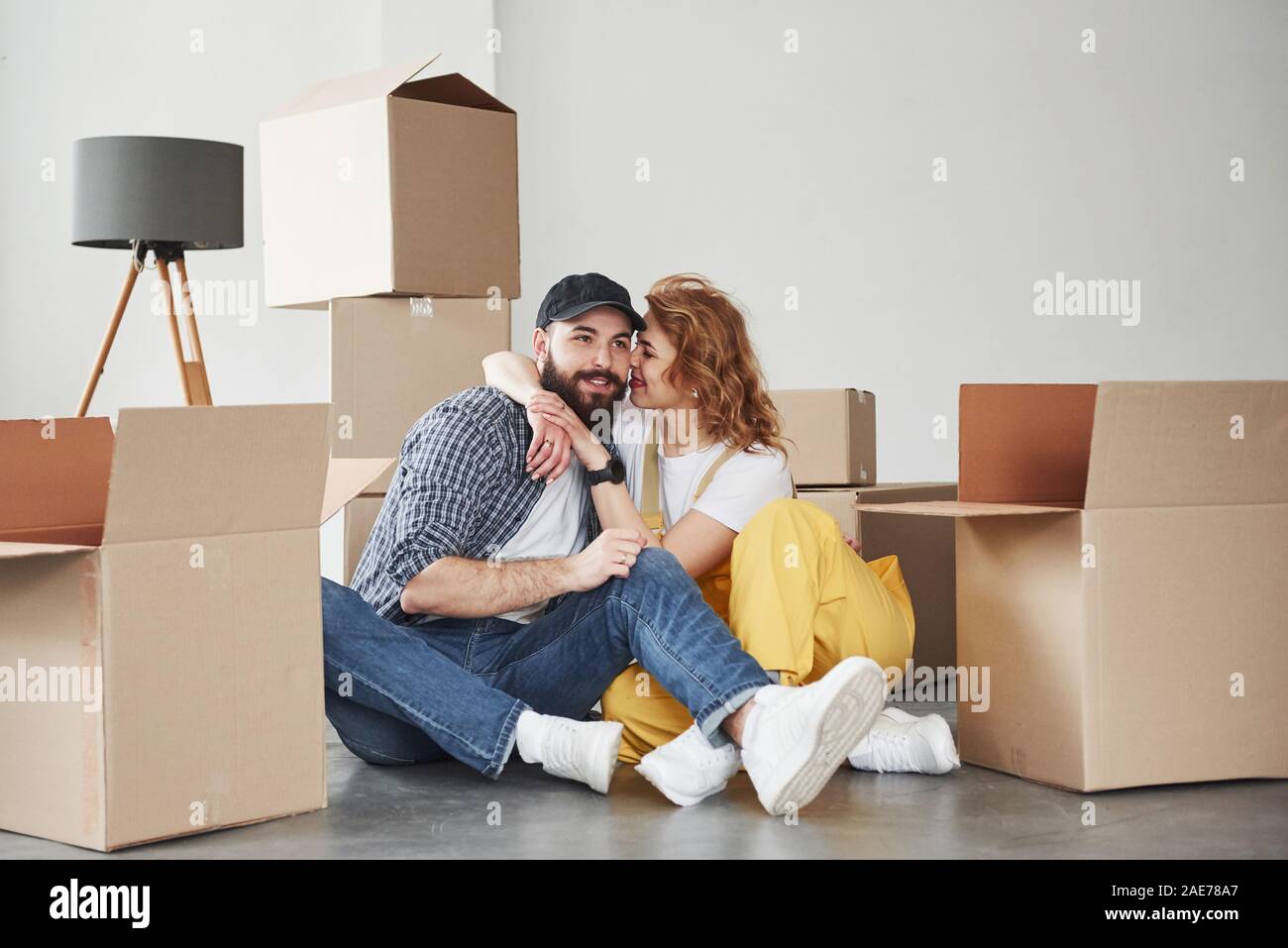 Empty interior, this is not for long. Happy couple together in their ...