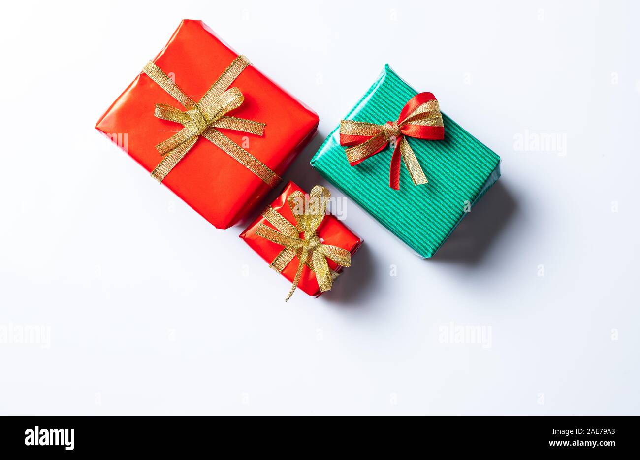 Three gift boxes isolated in white background. top view Stock Photo - Alamy