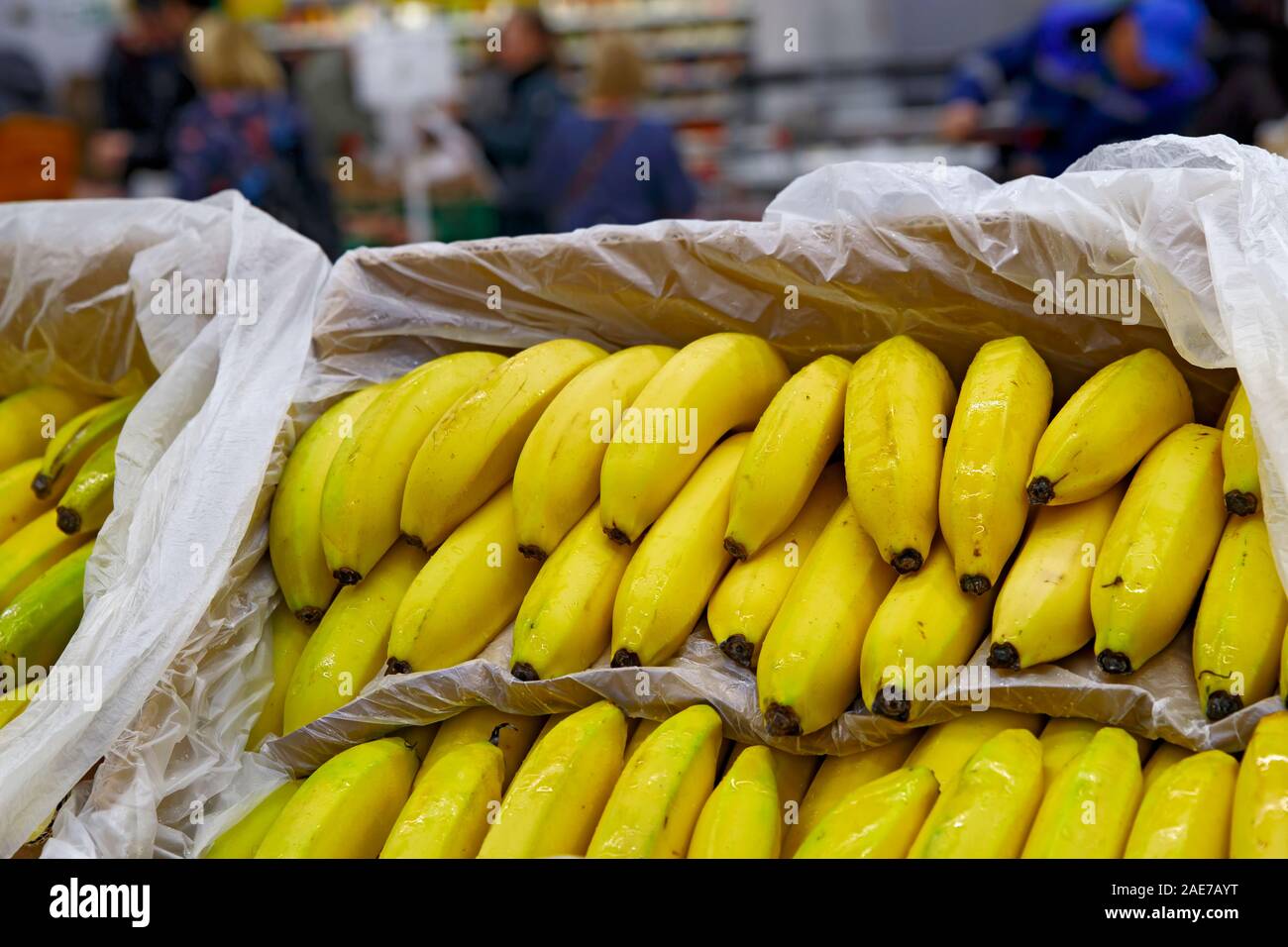 Seasonal fruits are placed in boxes in the grocery store. Close-up of ...