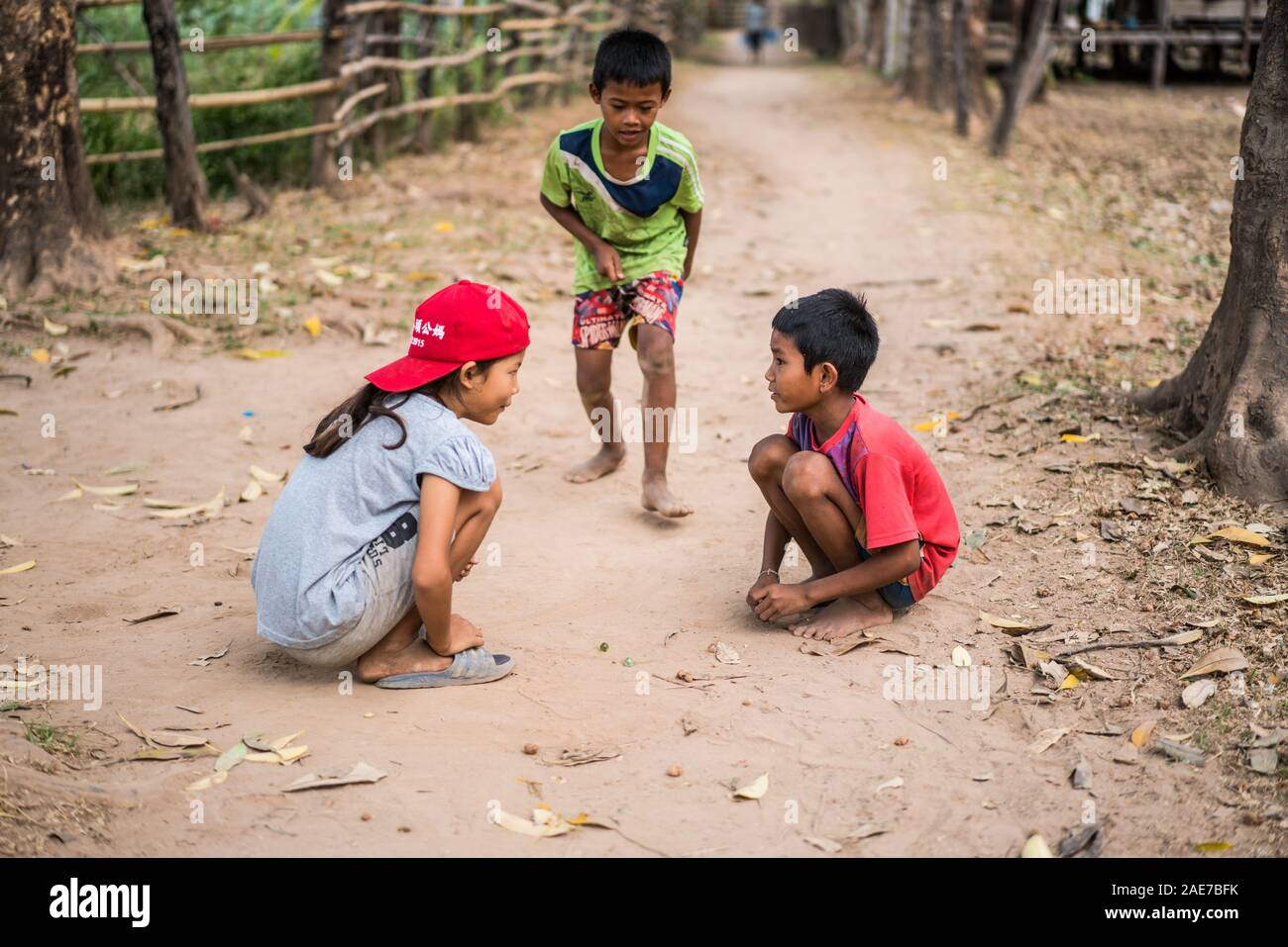 Children playing street marbles hi-res stock photography and images - Alamy