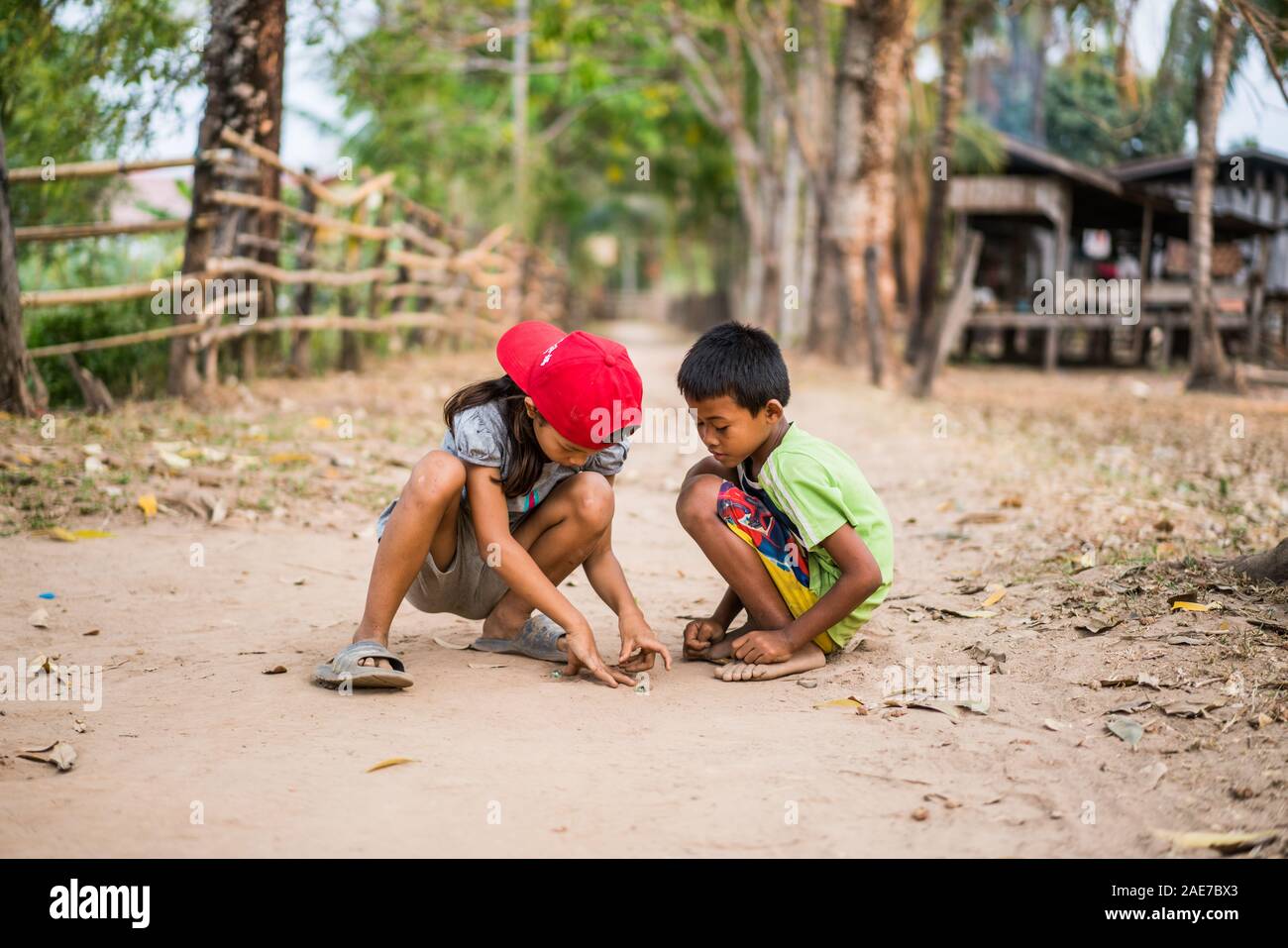 Children Playing Marbles High Resolution Stock Photography and Images ...