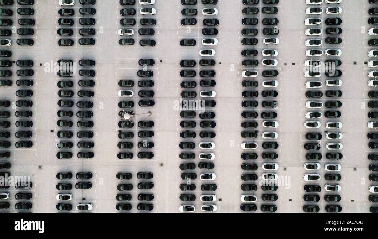 Aerial view of newly-manufactured Tesla Model 3 electric cars on the ...