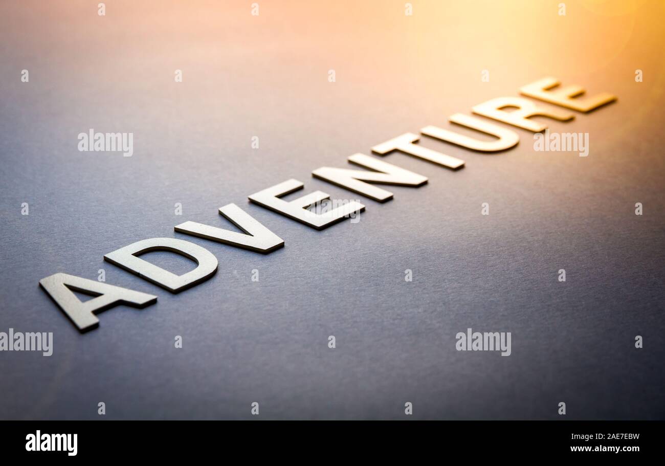 Word adventure written with white solid letters on a board Stock Photo ...
