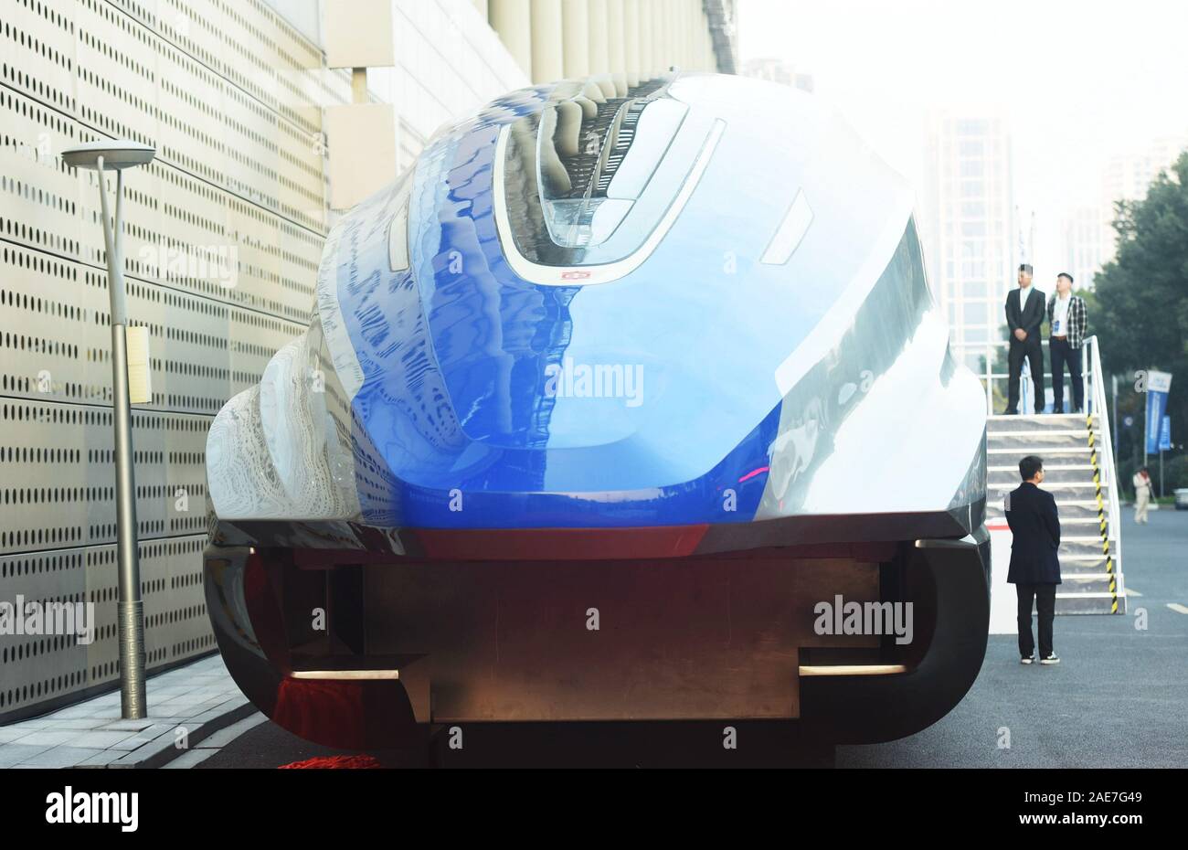 Visitors view the 600km/h high-speed maglev train by CRRC on display ...