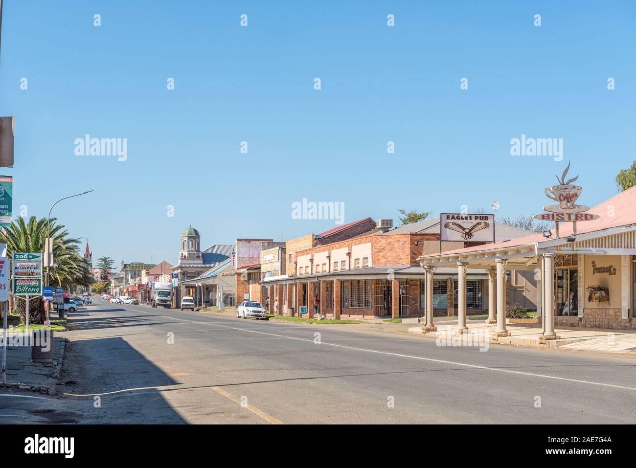 VREDE, SOUTH AFRICA - MAY 1, 2019: A street scene, with businesses and ...
