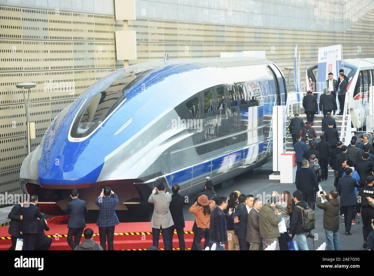 Visitors view the 600km/h high-speed maglev train by CRRC on display ...