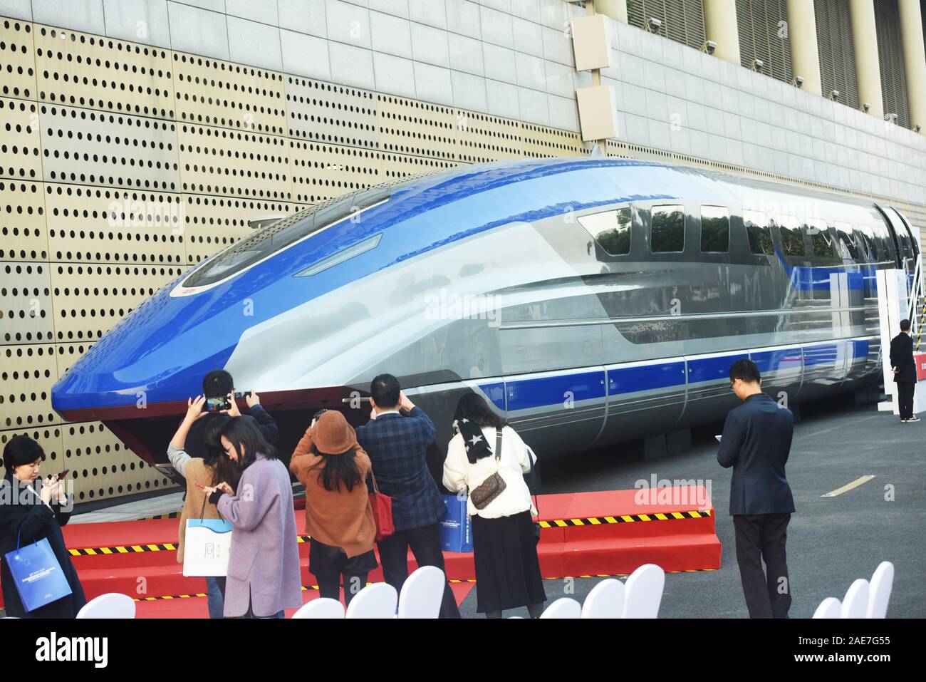 Visitors view the 600km/h high-speed maglev train by CRRC on display ...