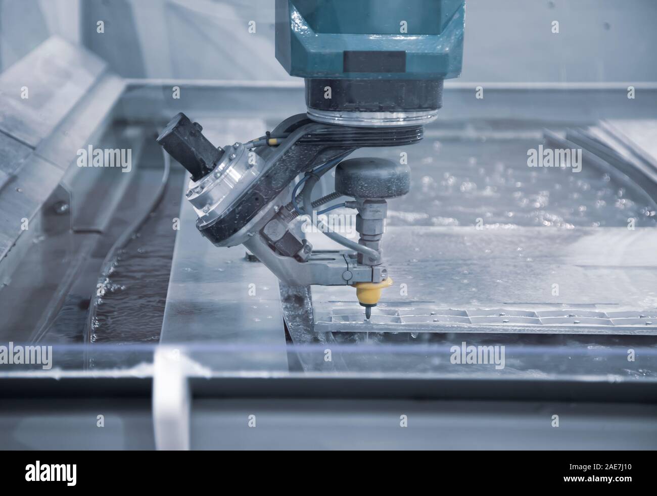 Modern industry CNC Abrasive water jet cutting machine Stock Photo - Alamy