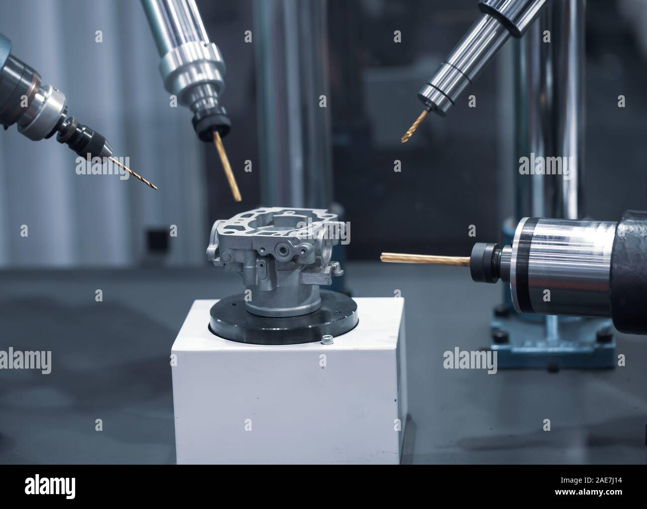 CNC perform drilling from multiple drilling tool Stock Photo - Alamy