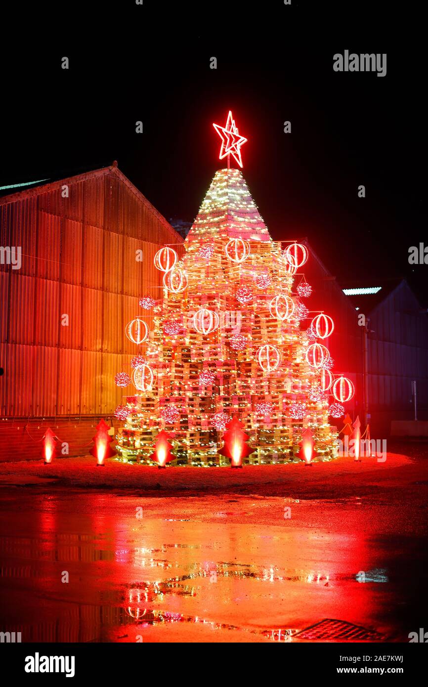 An innovative Christmas Tree, made from pallets of wood. This is ...