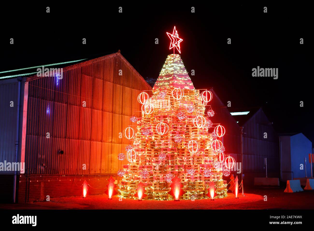 An innovative Christmas Tree, made from pallets of wood. This is ...