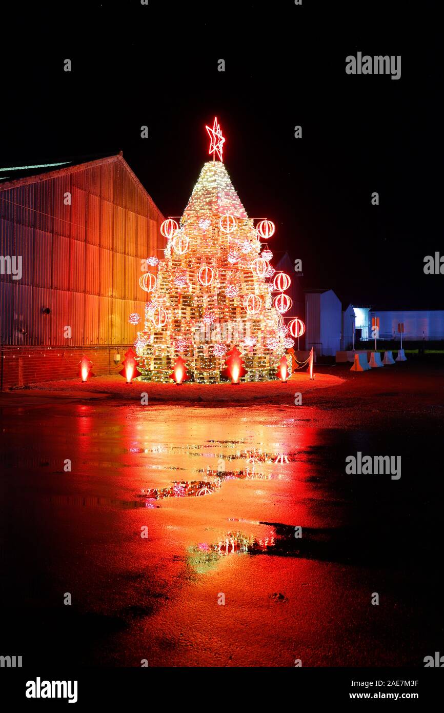 An innovative Christmas Tree, made from pallets of wood. This is ...