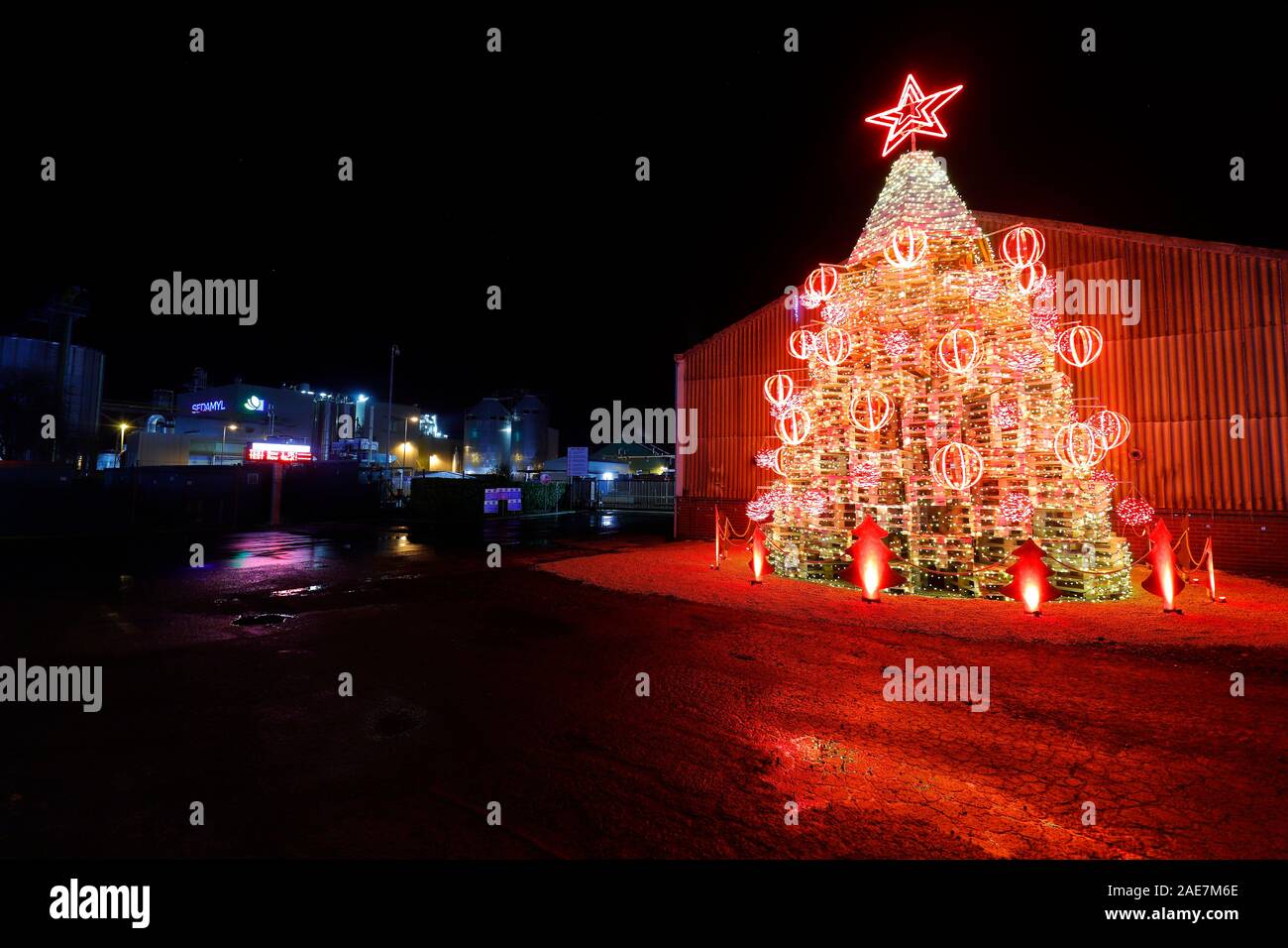 An innovative Christmas Tree, made from pallets of wood. This is ...