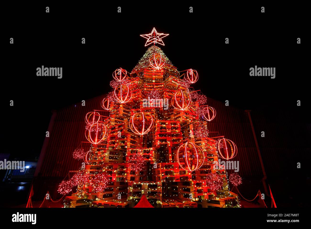 An innovative Christmas Tree, made from pallets of wood. This is ...