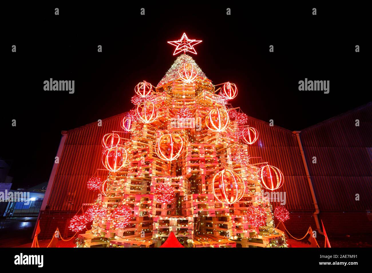 An innovative Christmas Tree, made from pallets of wood. This is ...