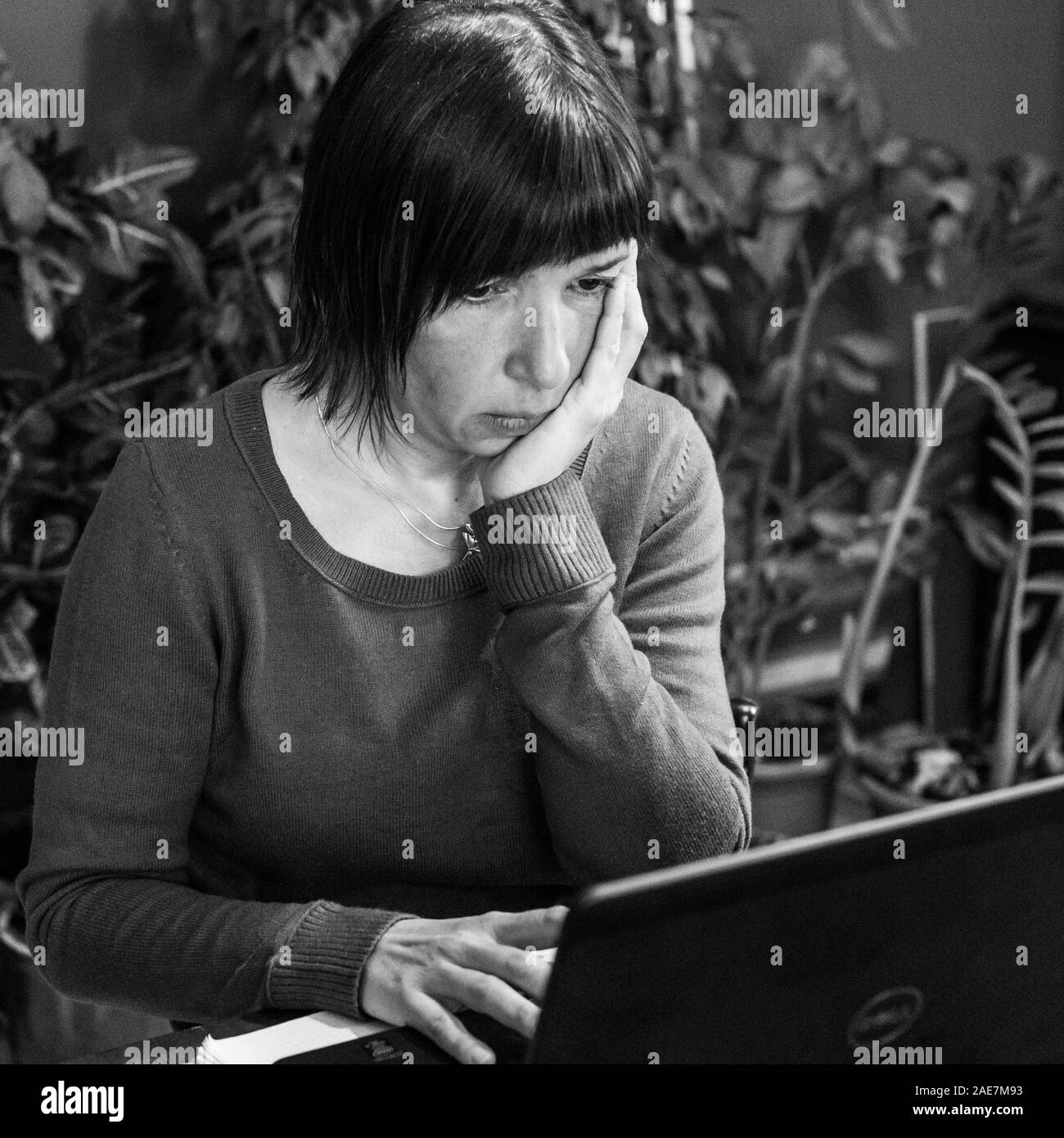 Black woman typing at computer Black and White Stock Photos & Images ...