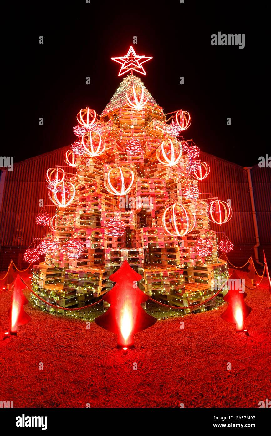 An innovative Christmas Tree, made from pallets of wood. This is ...