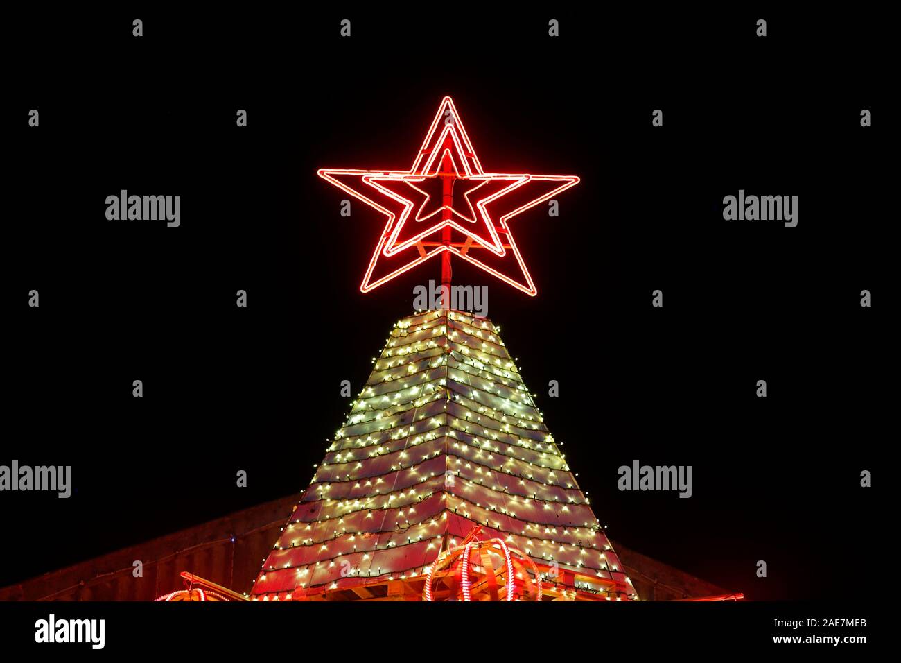 An innovative Christmas Tree, made from pallets of wood. This is ...