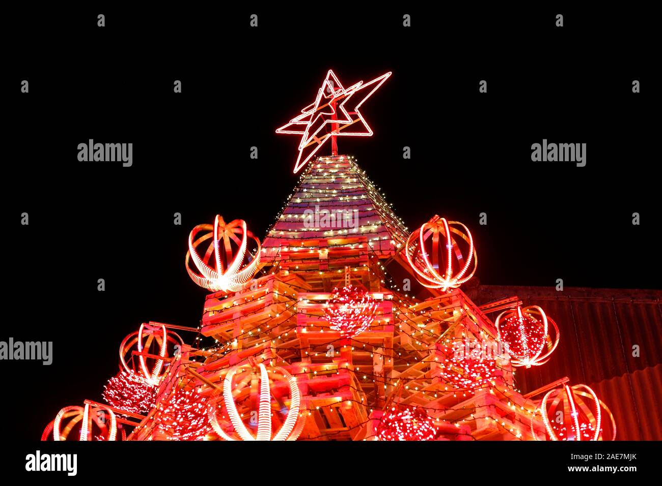 An innovative Christmas Tree, made from pallets of wood. This is ...