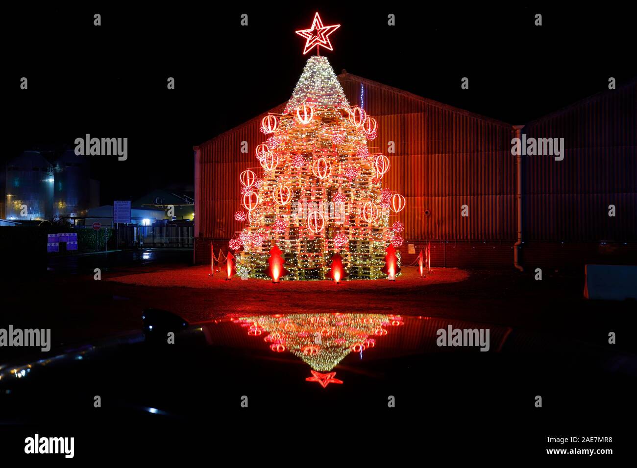 An innovative Christmas Tree, made from pallets of wood. This is ...