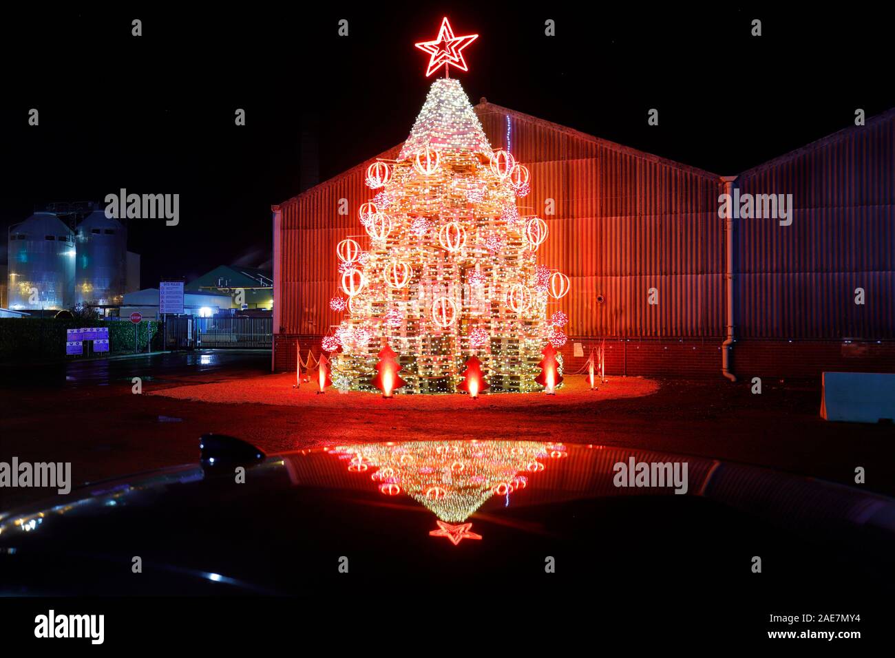 An innovative Christmas Tree, made from pallets of wood. This is ...
